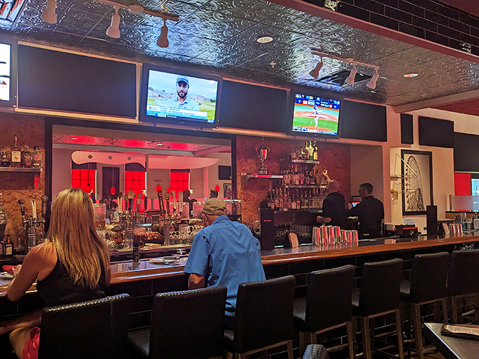 A bar where strangers become friends over perfectly mixed cocktails and shared appreciation for the game on screen.