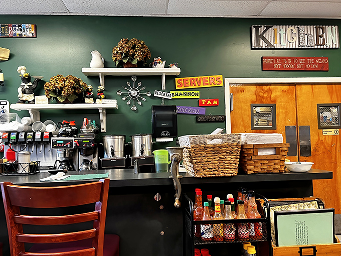 Counter seats offer front-row viewing of the breakfast ballet happening behind that service window.