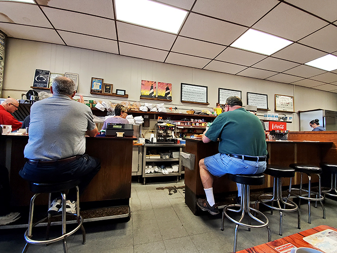 Counter seating: where solo diners become regulars, and the breakfast show unfolds before your eyes in all its sizzling, aromatic glory.