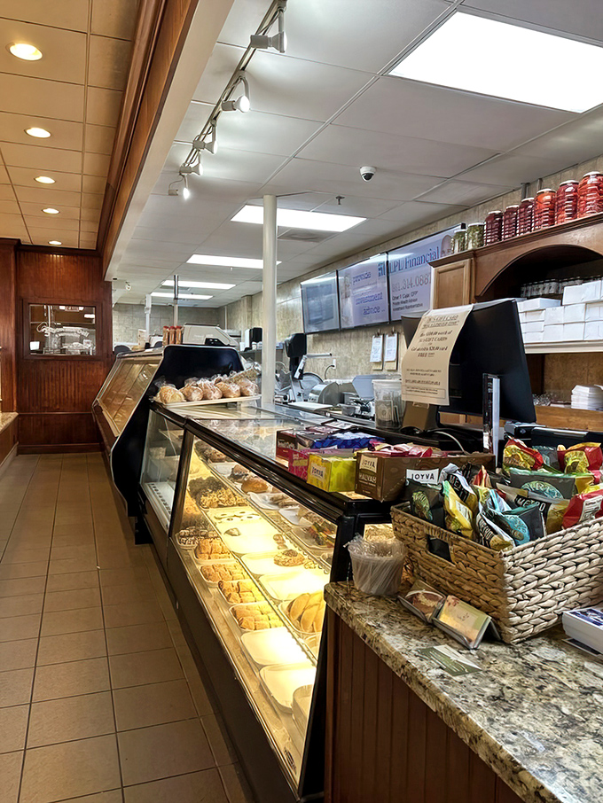 The counter area&mdash;where deli magic happens. Like watching Olympic athletes, but instead of medals, they're competing for your taste bud's affection.