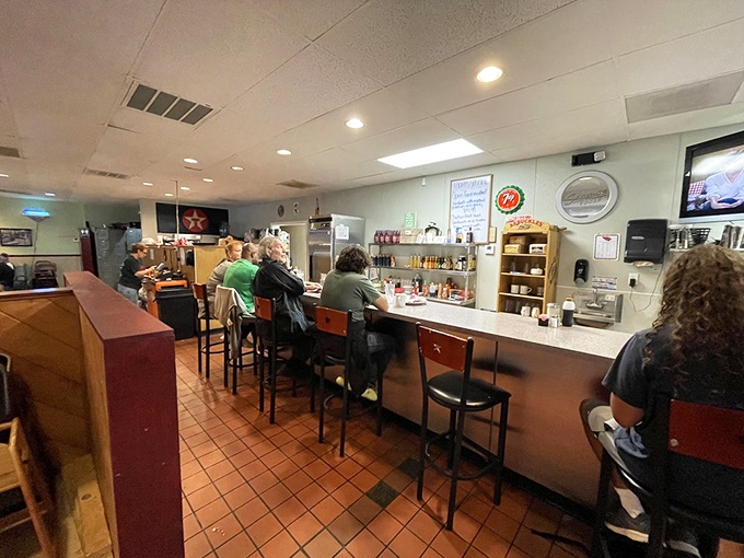Counter seating: where solo diners become temporary family and the kitchen's symphony of sizzles and clangs provides the soundtrack.