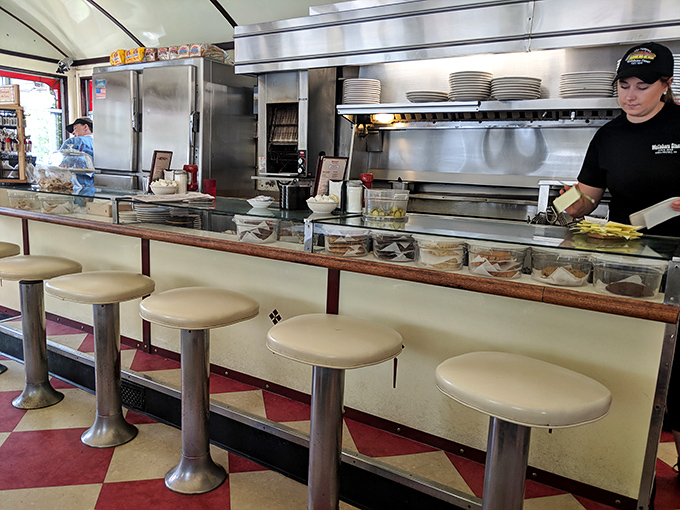 These counter stools have witnessed first dates, business deals, and countless "just coffees" over decades&mdash;each one a front-row seat to short-order magic.