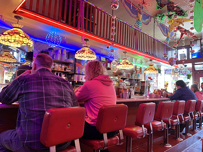 Counter culture at its finest&mdash;red swivel stools offer front-row seats to the breakfast show, where regulars and newcomers bond over shared appreciation for diner perfection.