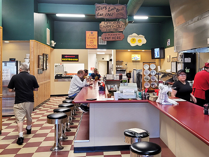 The counter seating offers prime real estate for solo diners and regulars who've earned their spot through years of faithful patronage.