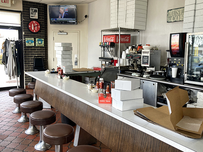 Classic diner counter seating&mdash;where solo diners become part of the HoneyDip family and coffee cups are never empty for long.