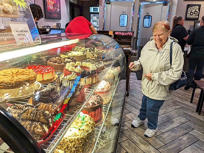 The look of pure joy as a customer contemplates the dessert case&mdash;a universal expression that says "diet starts tomorrow."