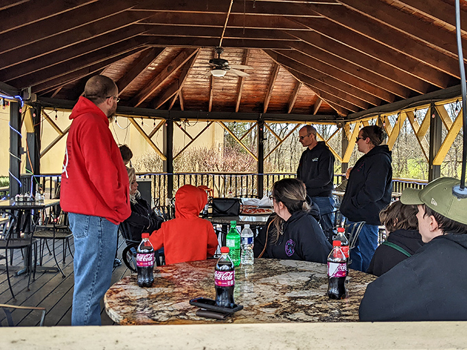 The outdoor pavilion brings together strangers over pizza and soda&mdash;proving that good food remains humanity's most effective social network. 