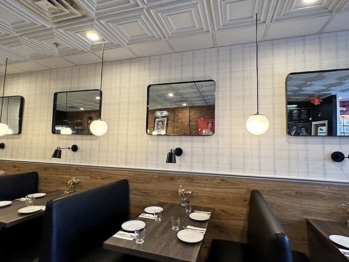 Clean lines, warm wood, and thoughtful lighting create a space that's both modern and timeless &ndash; like the best Italian cooking itself.