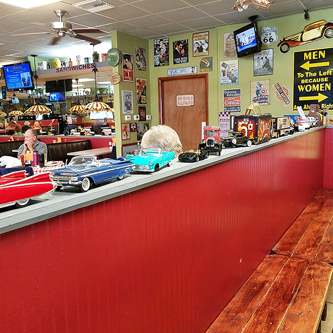 The wall d&eacute;cor is a glorious mishmash of Americana, vintage signs, and model cars&mdash;like your coolest uncle's garage reimagined as a restaurant. 