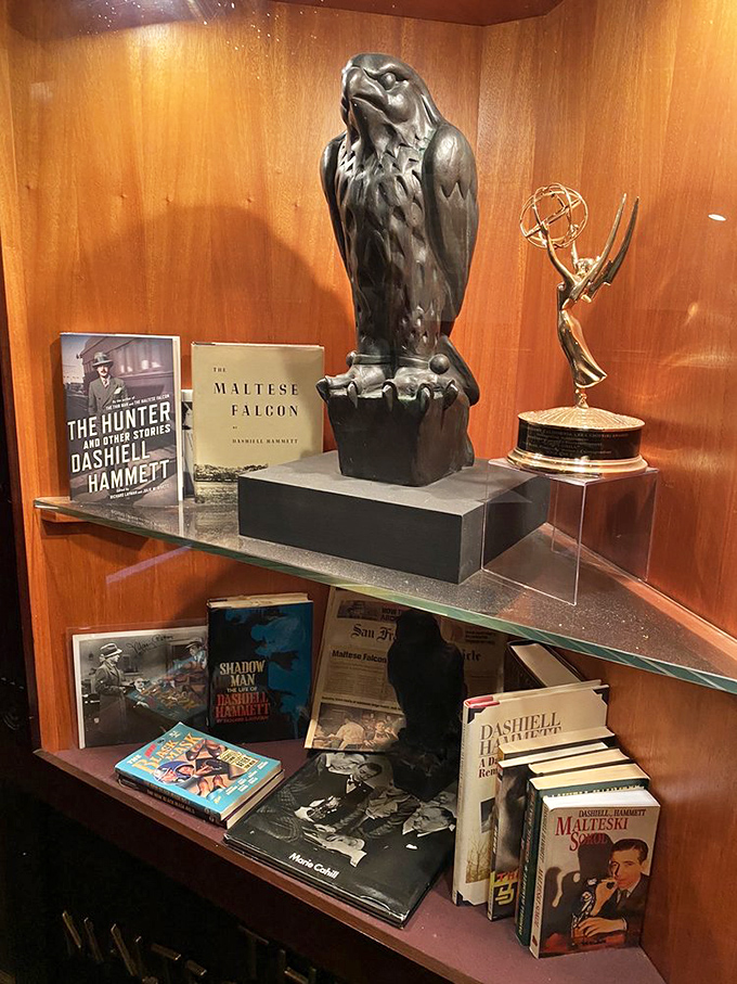 The Maltese Falcon display reminds diners they're eating in a place where literature and cuisine have been dancing partners for generations.