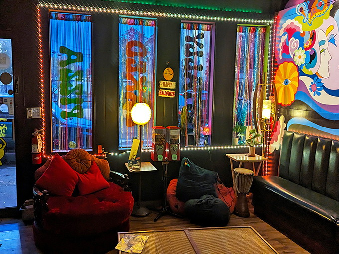 Beaded curtains and mood lighting create little pockets of privacy in this technicolor dreamscape where every corner offers a new visual treat.