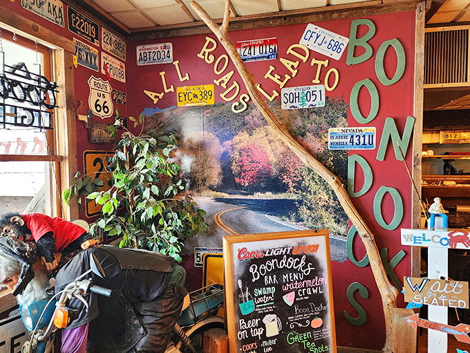 The wall that tells you everything: "All Roads Lead to Boondocks." A colorful manifesto of local pride and seafood devotion.