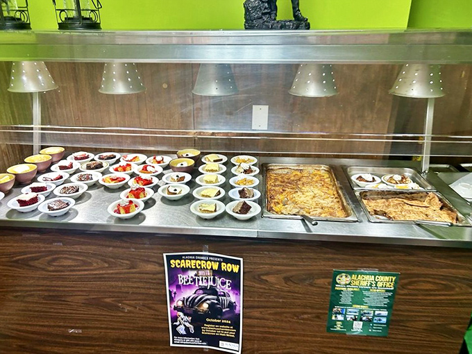 The dessert station: where willpower goes to die a happy death. Those individual cups hold promises that your diet can't compete with.