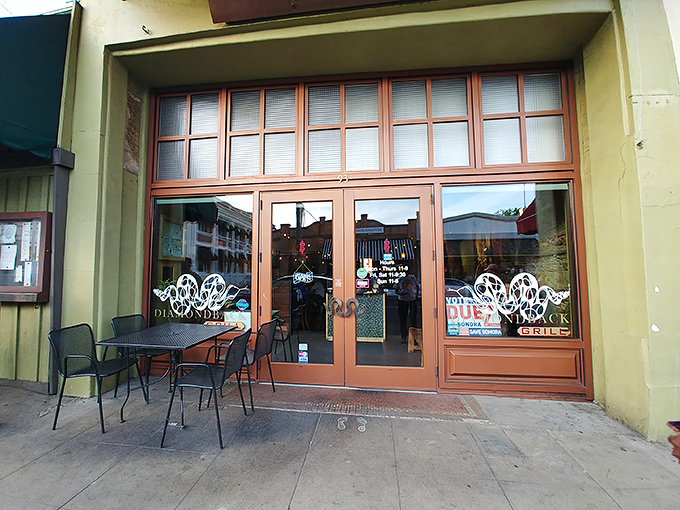 Diamondback Grill's inviting entrance promises comfort food with flair—the kind of place where regulars and visitors receive equally warm welcomes.