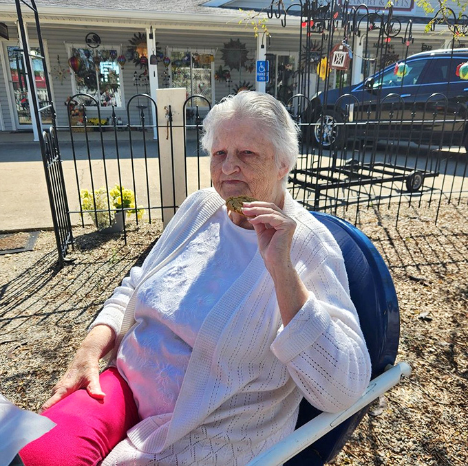 I'm not saying this woman has discovered the secret to happiness, but that expression while eating suggests she's definitely onto something.