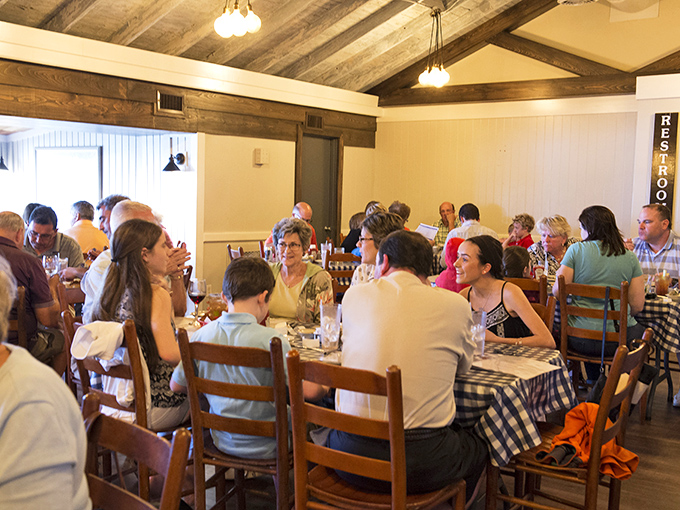 The happy buzz of diners creating memories over seafood. Some conversations are best seasoned with crab legs and white wine.