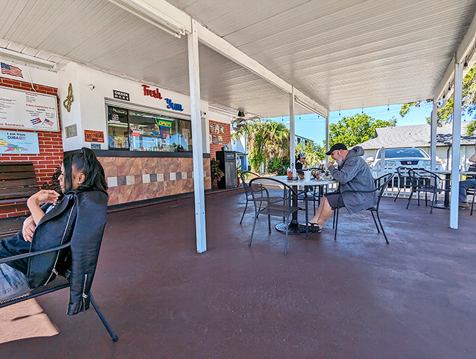Simple metal chairs and tables create the perfect stage for the real star of the show&mdash;that sandwich you're about to demolish.
