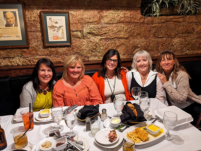 A group enjoying the convivial atmosphere proves that the best dining experiences are about the company as much as the cuisine.