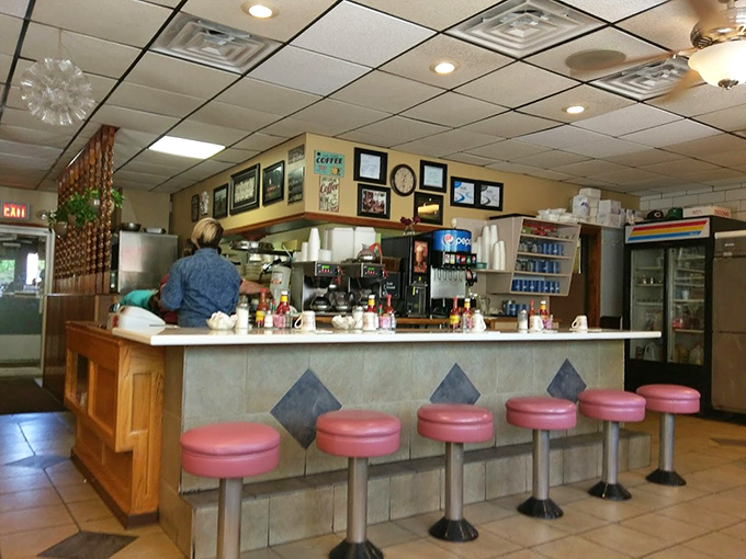 Pink counter stools that have supported generations of Elgin residents&mdash;silent witnesses to first dates, family traditions, and solo contemplations.