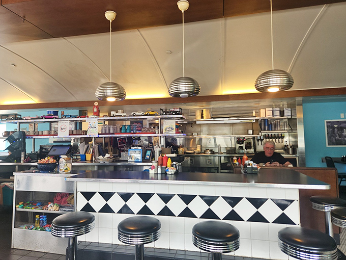 The counter seating – where solo diners become part of the Village Diner family and breakfast becomes dinner theater.