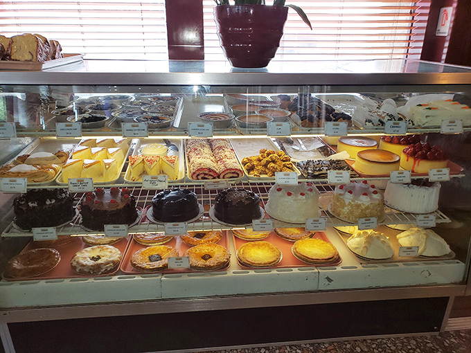 The dessert case&mdash;where willpower goes to die and "I'll just have coffee" turns into "and a slice of everything."