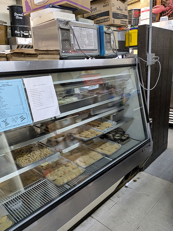 Behind this glass lies seafood treasure&mdash;a display case showcasing the ocean's bounty waiting to become someone's delicious memory.