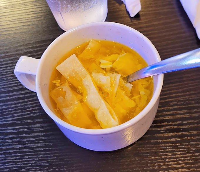 Egg drop soup&mdash;comfort in a cup. Those ribbons of egg floating like golden scarves in a savory broth.