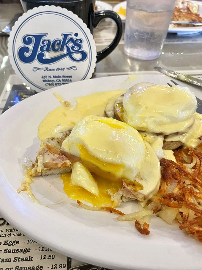Eggs Benedict with perfectly poached eggs that burst like flavor bombs over what might be the best breakfast in the Eastern Sierra.