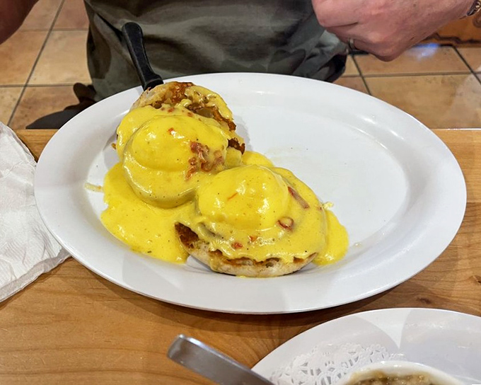 Eggs Benedict: the breakfast equivalent of putting on a tuxedo before noon. This golden-sauced version makes the formality absolutely worth it.