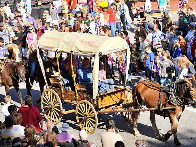 Horse-drawn carriages clop through festival crowds, transporting passengers not just across town but seemingly back in time.