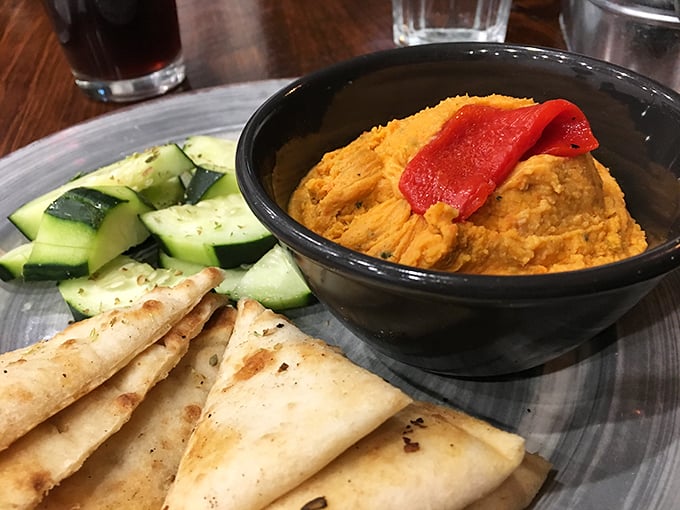 That fiery feta dip is the kind of spicy, creamy concoction that ruins all other dips for you. Pita triangles standing by for the perfect delivery system.