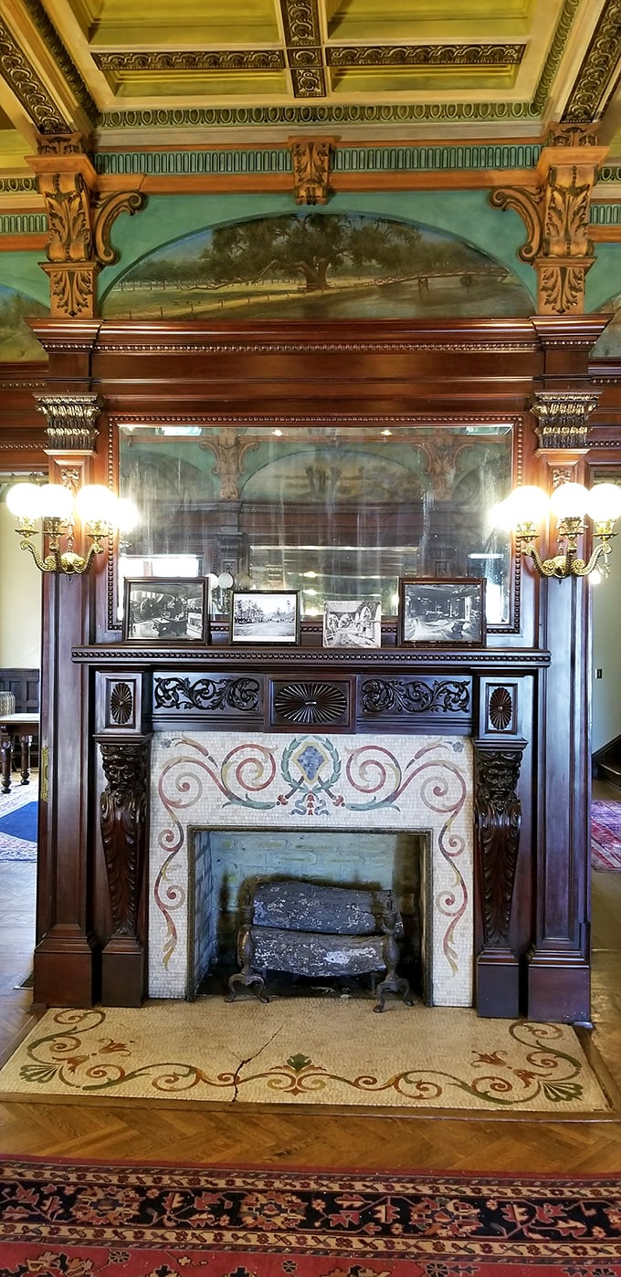 This isn't just a fireplace&mdash;it's a masterpiece of craftsmanship. The hand-painted tile work and carved mantel showcase Gilded Age opulence at its finest.
