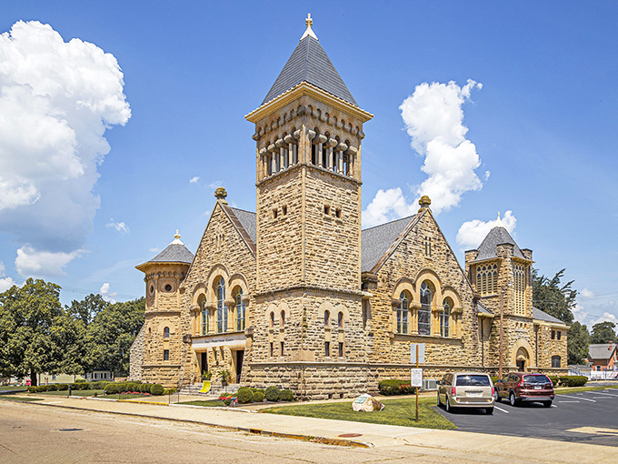 First Presbyterian's magnificent stone tower reaches skyward like a Midwest cathedral, proving small towns can deliver big architectural statements without the big-city attitude.