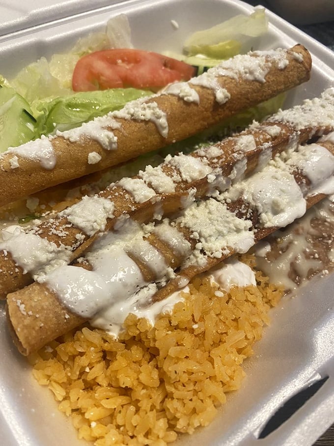 These flautas stand at attention, crispy soldiers drizzled with crema and ready to march straight into your heart.
