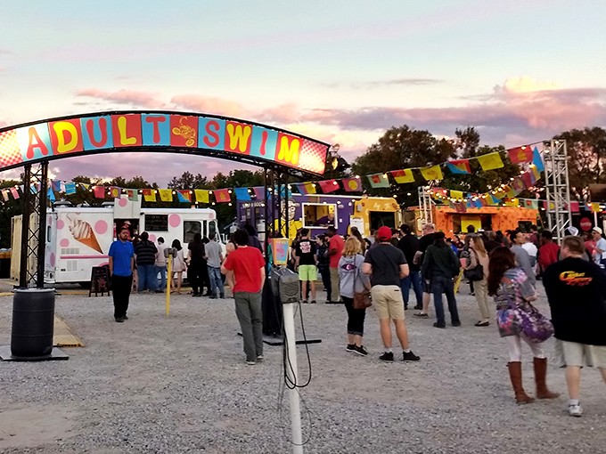 The "Adult Swim" food truck court transforms the drive-in into a carnival of culinary possibilities between double features.