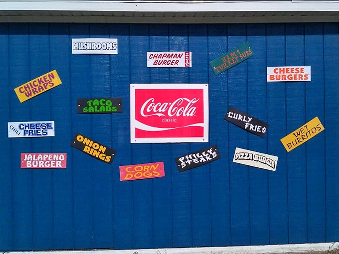 A colorful declaration of delicious intent &ndash; this wall doesn't just list menu items, it broadcasts a commitment to American roadside classics.