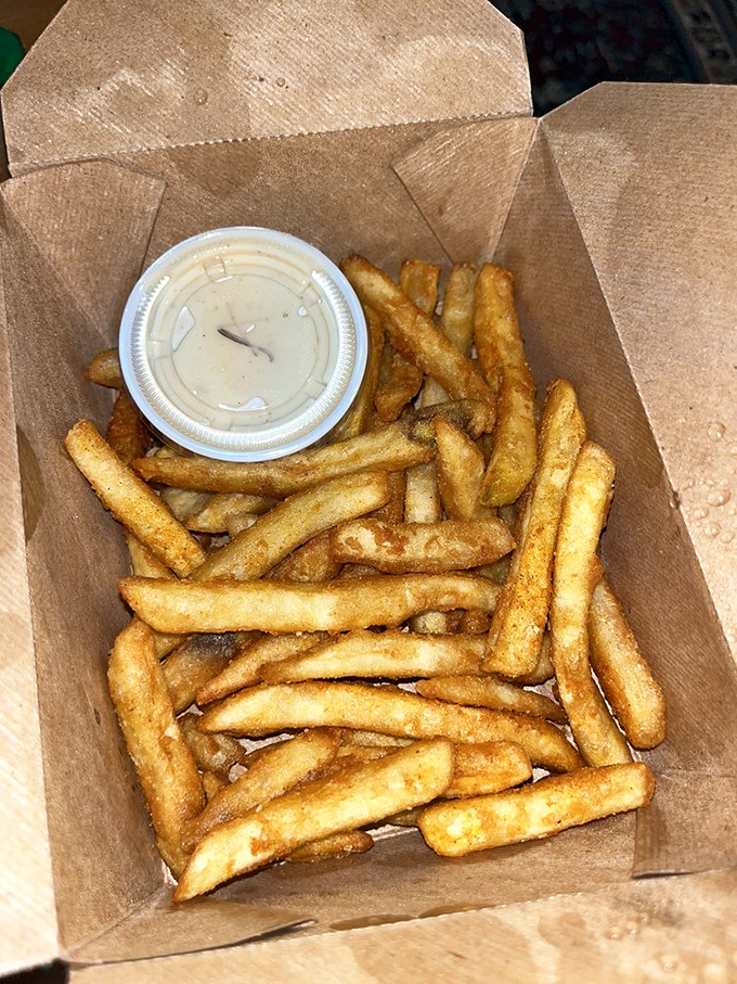 French fries that achieve the golden trifecta: crispy exterior, fluffy interior, and just enough seasoning to make you forget about ketchup entirely.
