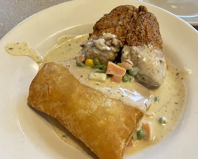 The Fried Chicken Pot Pie combines two comfort food legends into one creamy, flaky masterpiece. Innovation through tradition.