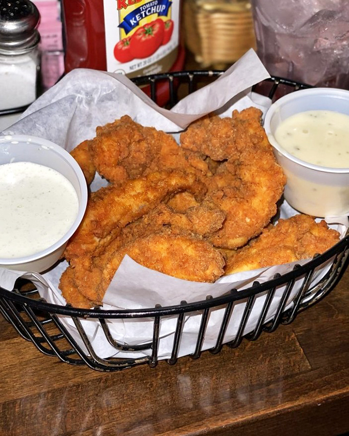 Chicken strips that put fast food versions to shame. Crispy, substantial, and served with dipping sauces that weren't squeezed from packets&mdash;this is comfort food elevated.