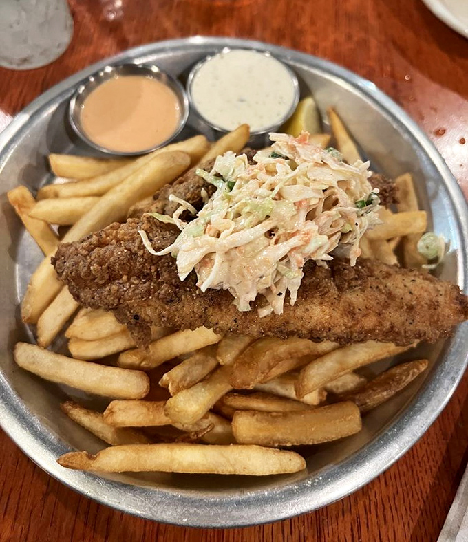 Crispy catfish and golden fries with slaw that doesn't know whether it's a garnish or a co-star&mdash;either way, it steals scenes.