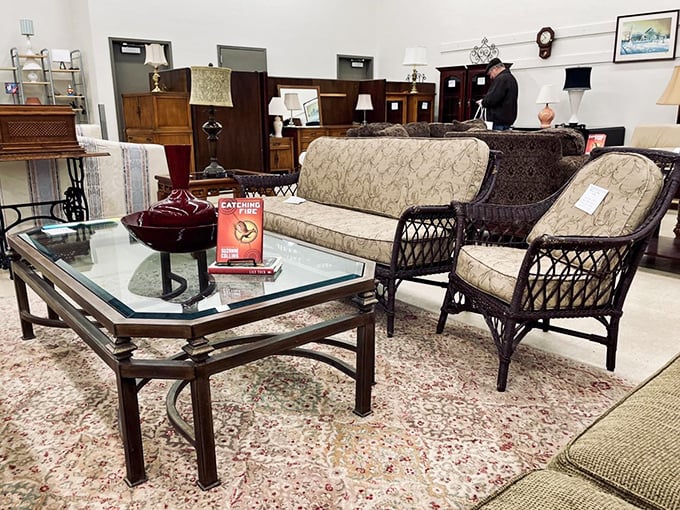 Living room elegance that whispers "I have taste" without screaming "I'm in debt." Wicker meets sophistication in this furniture vignette.