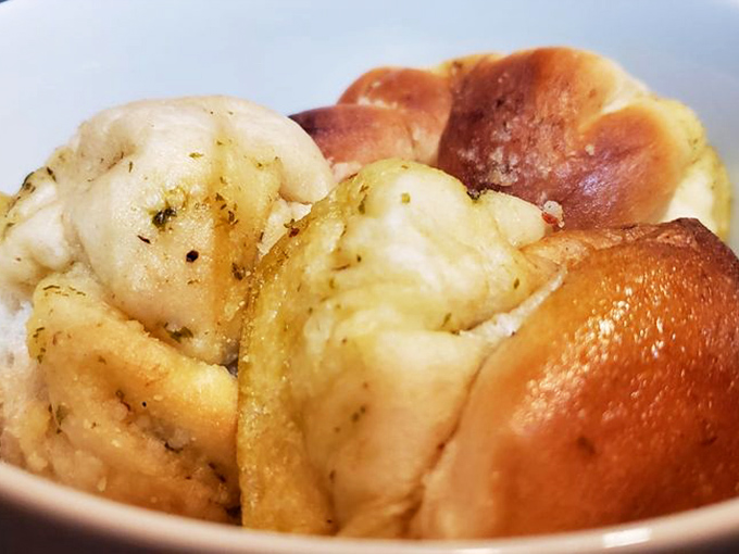 Garlic knots so aromatic and perfectly golden, they could convert even the most dedicated carb-avoiders back to happiness.