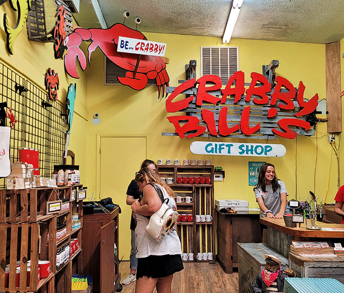 The gift shop's vibrant yellow walls and crab-themed merchandise ensure you'll take home more than just memories &ndash; and possibly a "BE...CRABBY!" sign you didn't know you needed.