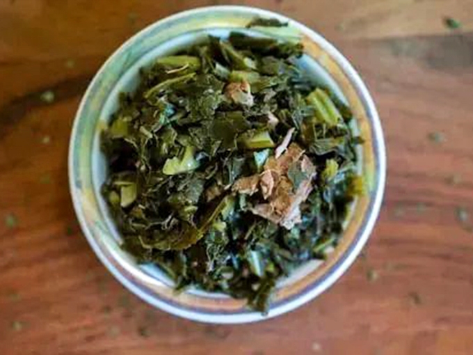 Collard greens done right &ndash; tender yet substantial, with just enough pot liquor to make you consider drinking what's left in the bowl.