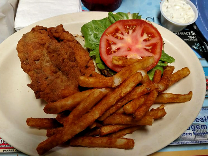 A grouper sandwich that demands respect&mdash;and possibly an extra napkin&mdash;flanked by fries that aren't just sides, they're supporting actors deserving awards.