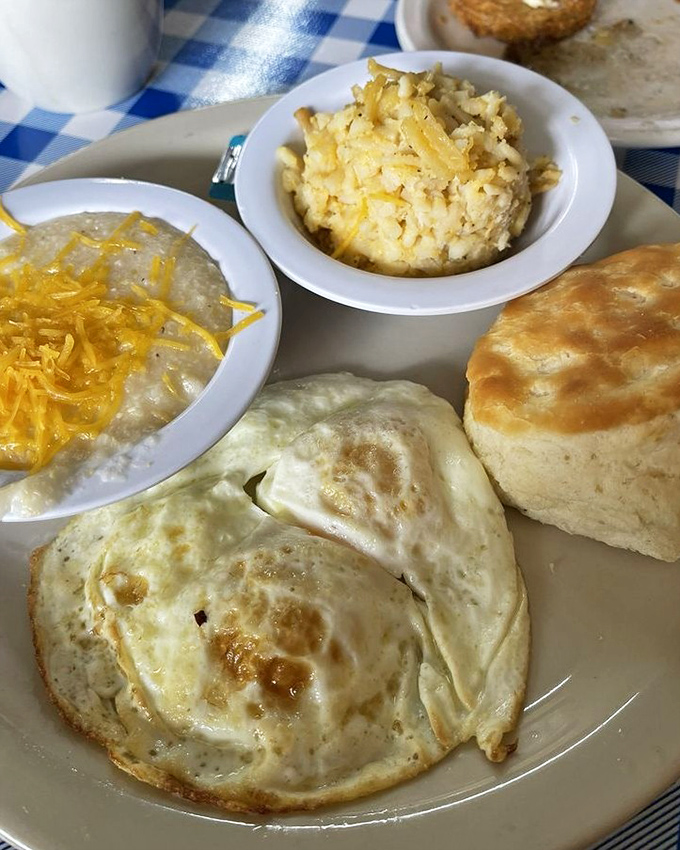 Breakfast perfection: eggs with just-right yolks, cheese grits that could convert a Northerner, and a biscuit that defies gravity.