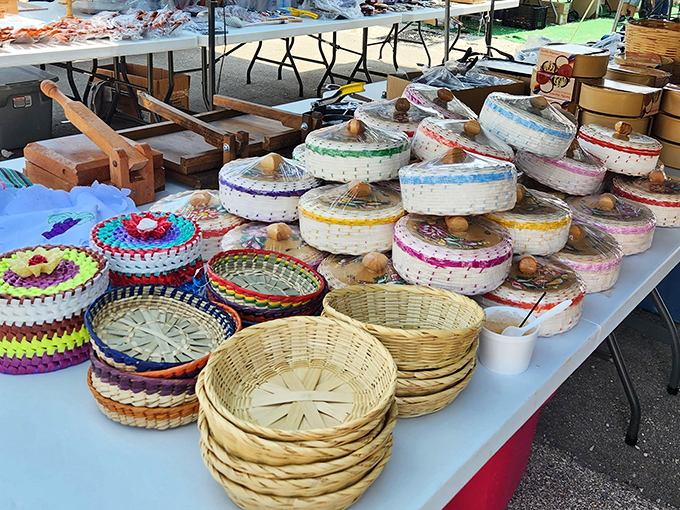 Handwoven baskets in every imaginable color showcase the intricate craftsmanship that turns simple materials into functional art with cultural significance.