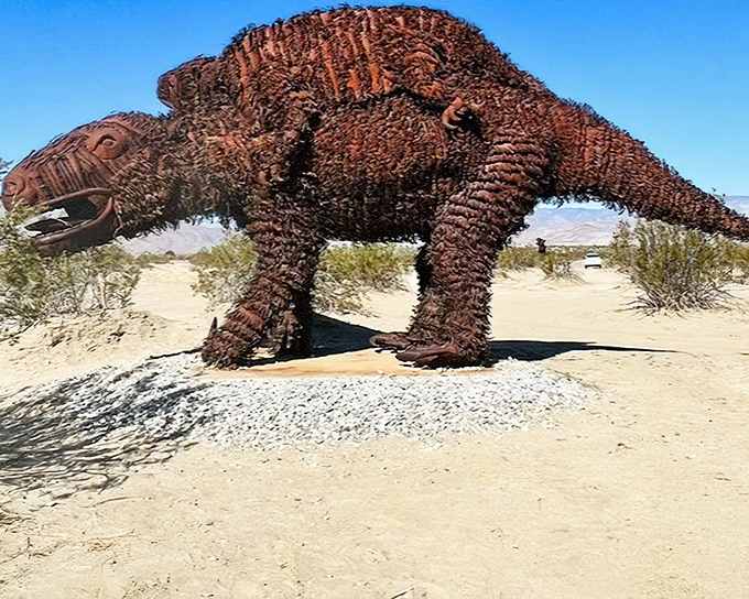 The prehistoric ground sloth lumbers across the desert, its massive form a reminder of the giants that once called this arid landscape home.