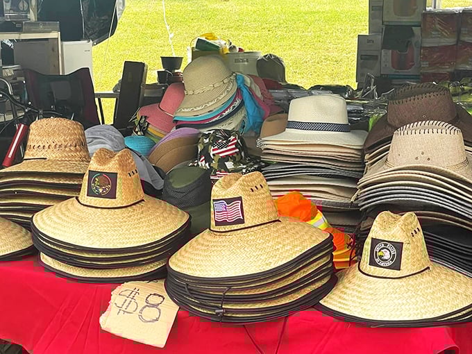 A sea of straw hats with patriotic patches&mdash;practical sun protection that doubles as a souvenir of Blue Ridge summer adventures.