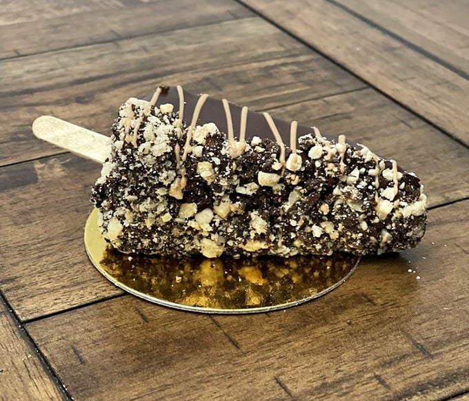 This chocolate-dipped creation on a stick proves that sophisticated desserts can still be fun. The crushed nuts add textural magic.